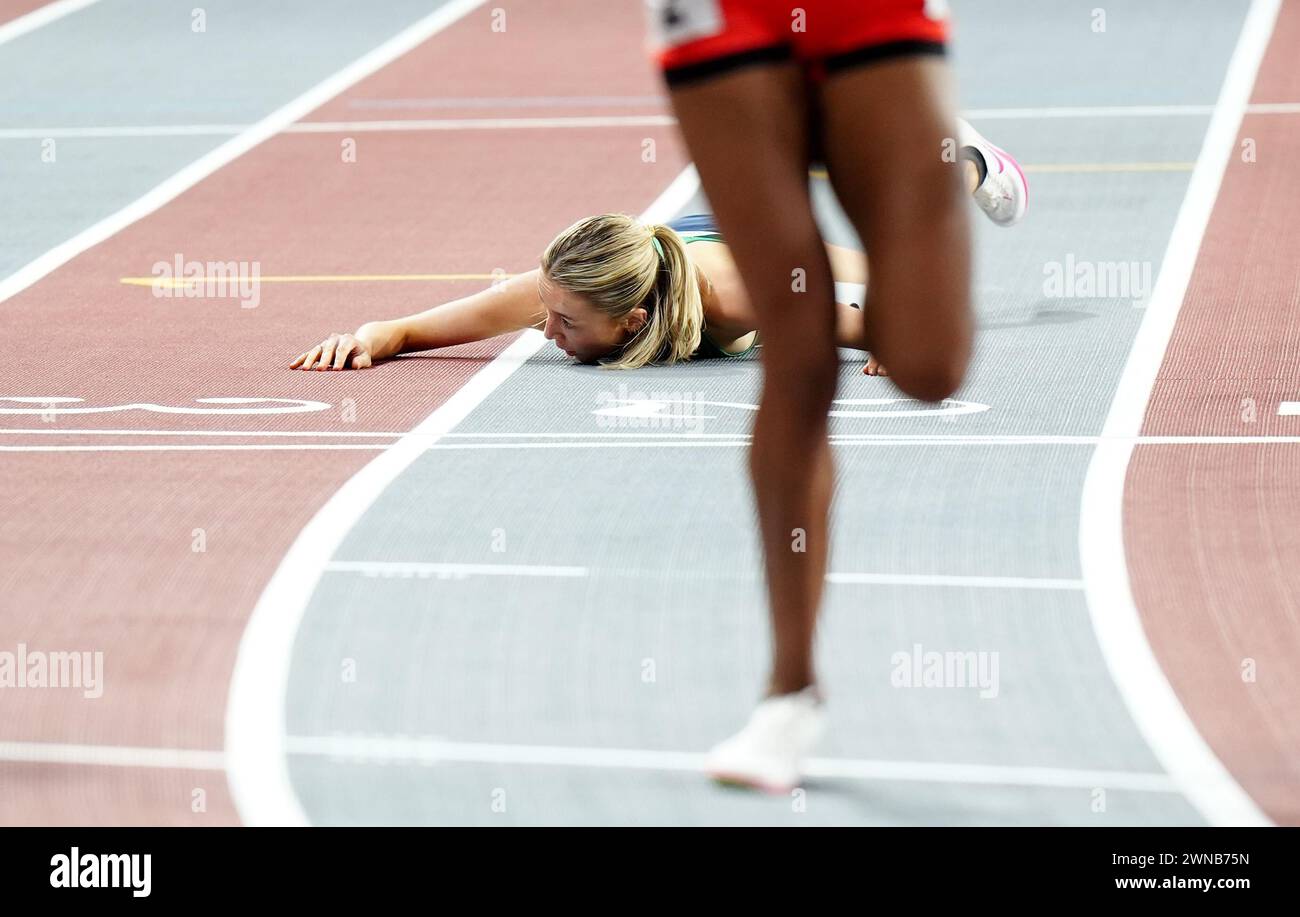 Ireland's Sarah Healy (second right) falls to the ground before the ...