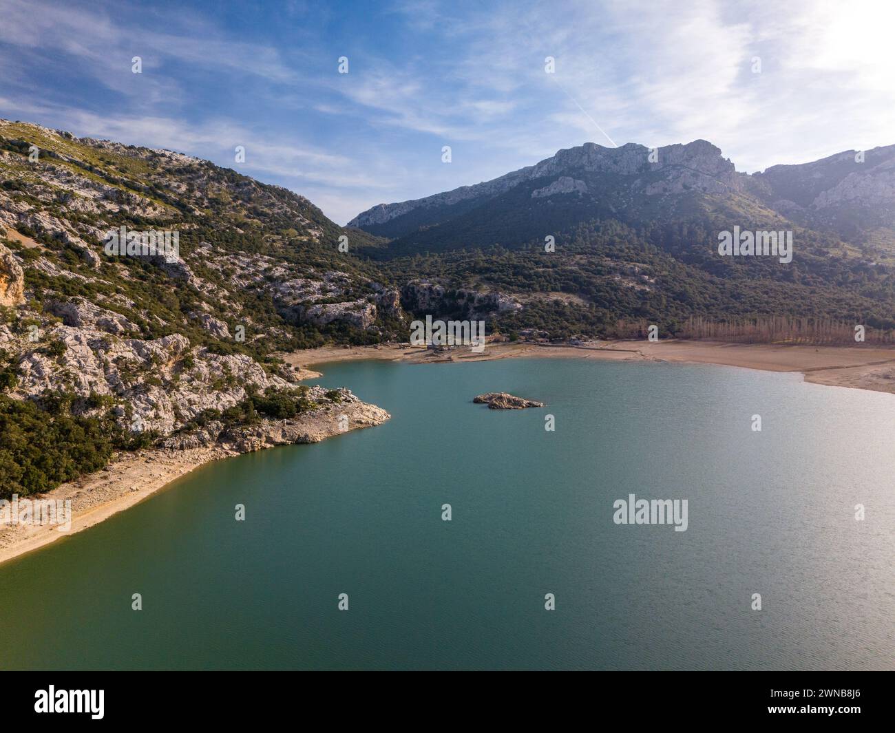Mountainside with water and blue sky scenery: Mallorca, Gorg Blau lake ...