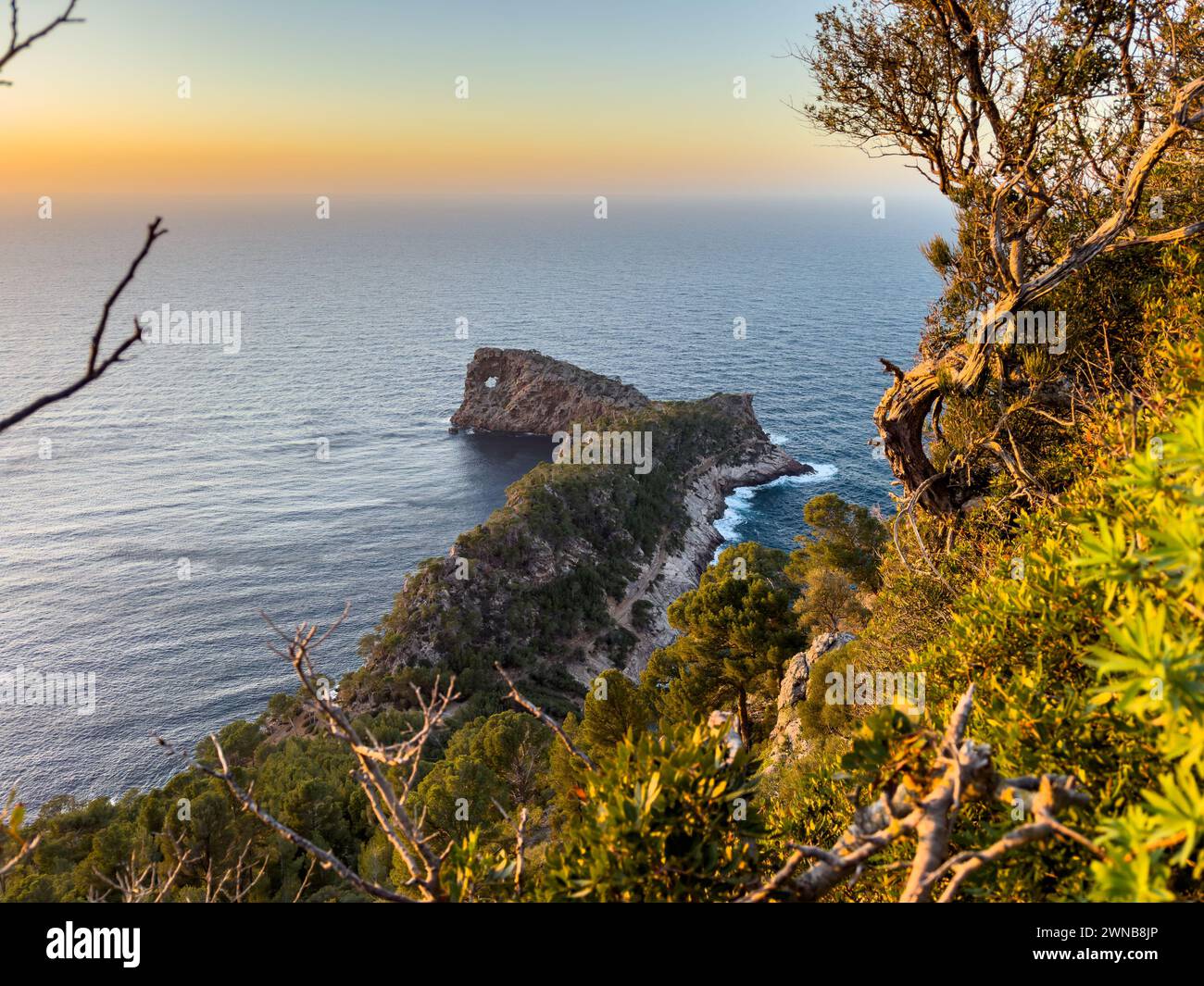 An aerial view of ocean and cliff at sunset: Mallora Stock Photo - Alamy