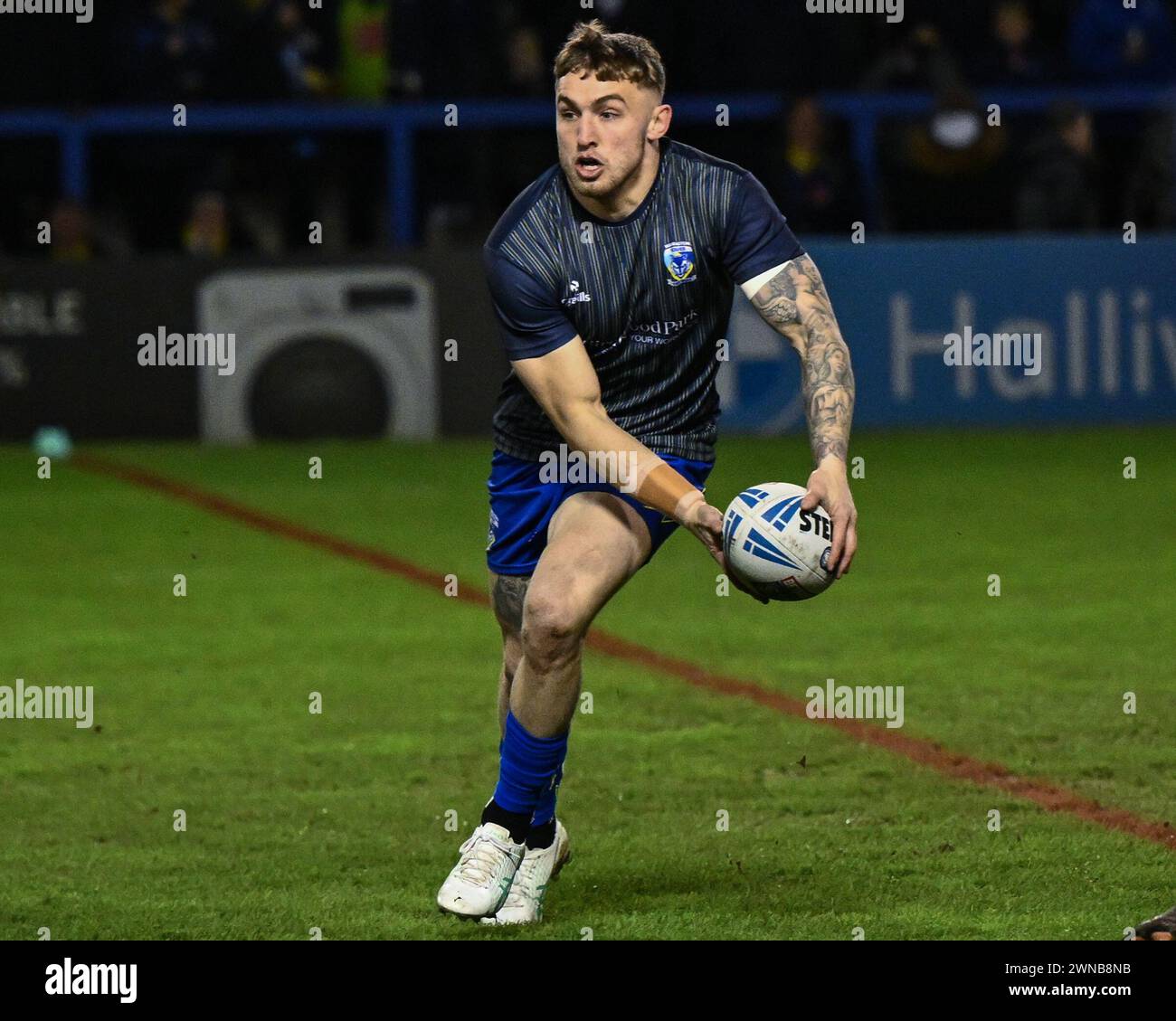 Sam Powell of Warrington Wolves in the pregame warmup session during ...