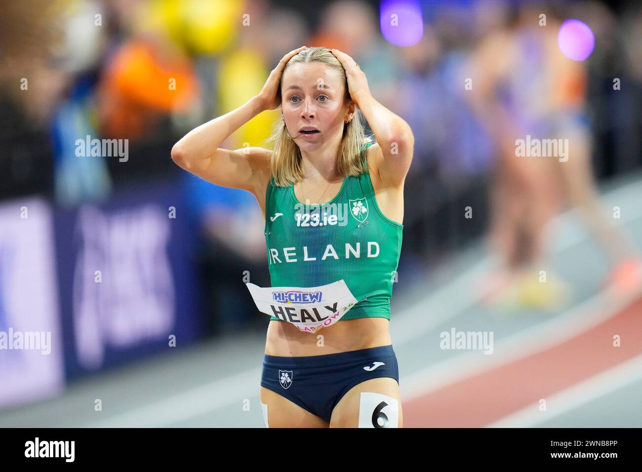 Sarah Healy, of Ireland, reacts after falling to the ground approaching ...