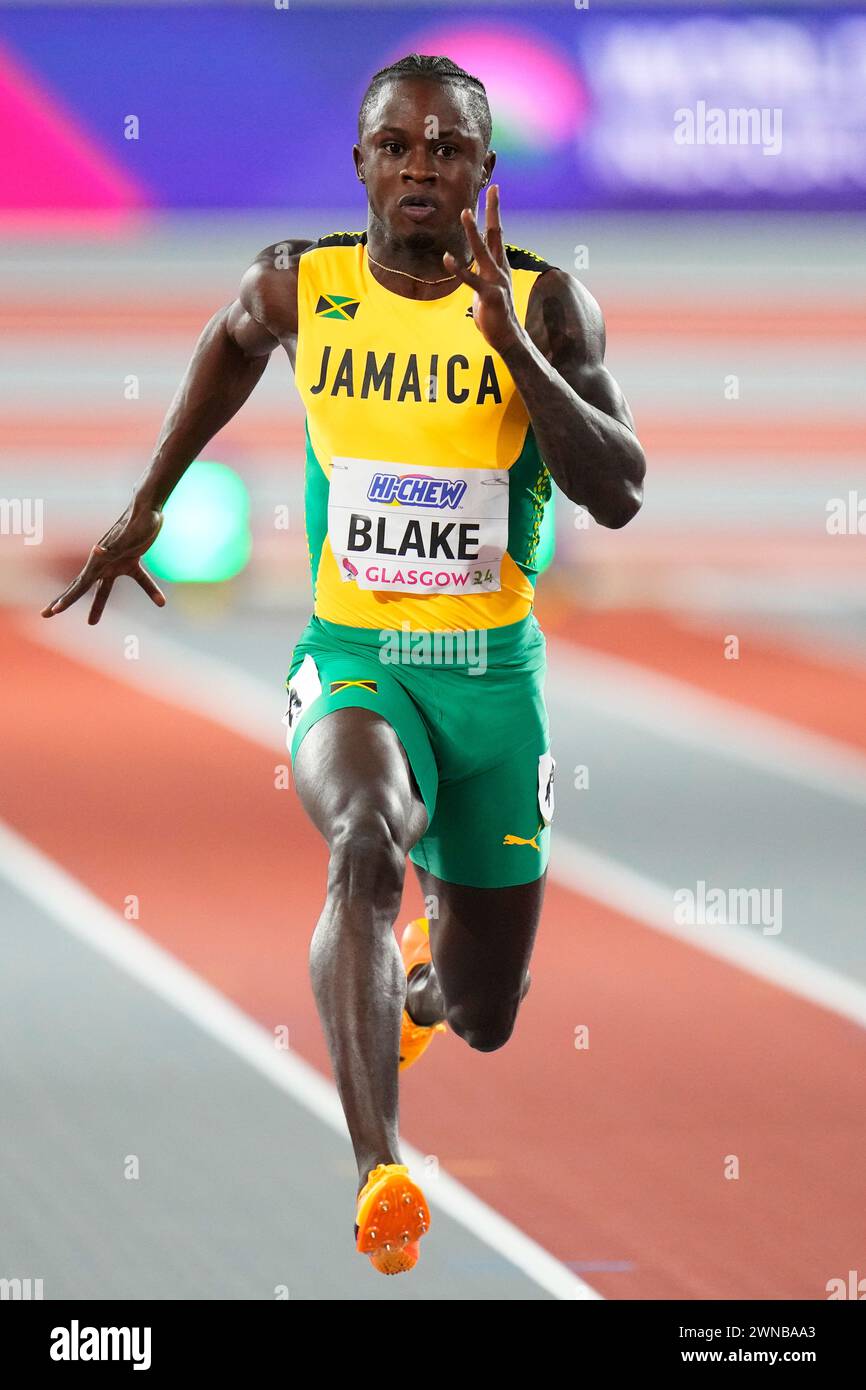 Ackeem Blake, of Jamaica, competes in a men's 60 meters semifinal ...