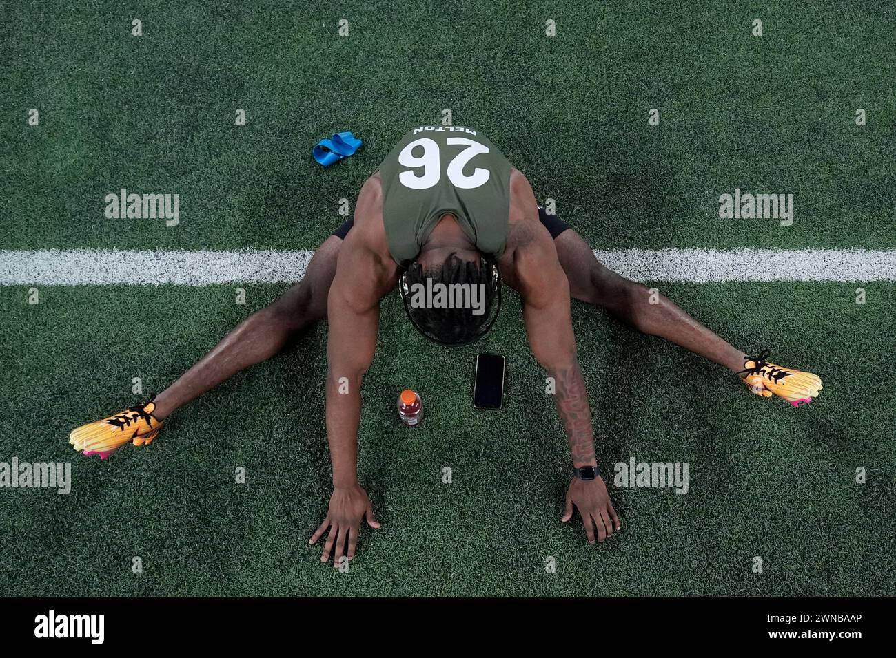 Rutgers defensive back Max Melton stretches at the NFL football ...