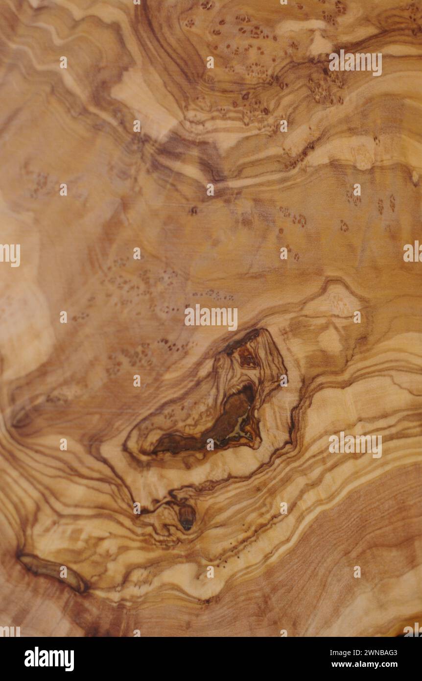 A piece of wood with a unique pattern of grooves and ridges Stock Photo ...