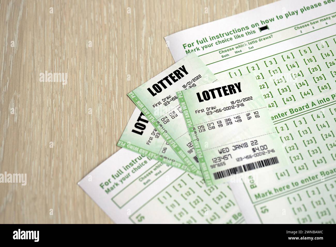 Green lottery tickets and blank bills with numbers for playing lottery ...