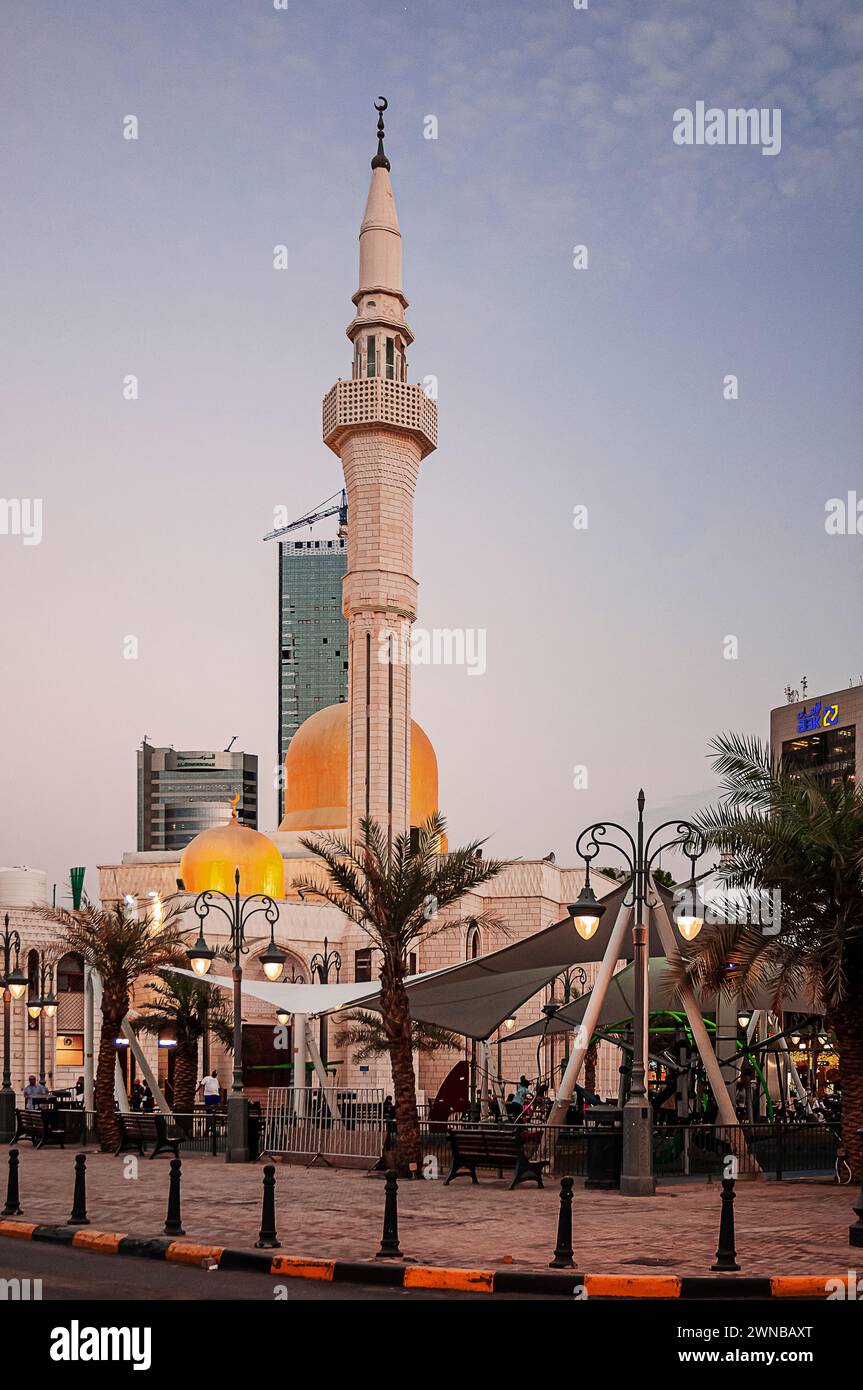 the mesmerizing beauty of the Grand Mosque of Kuwait City at sunset ...