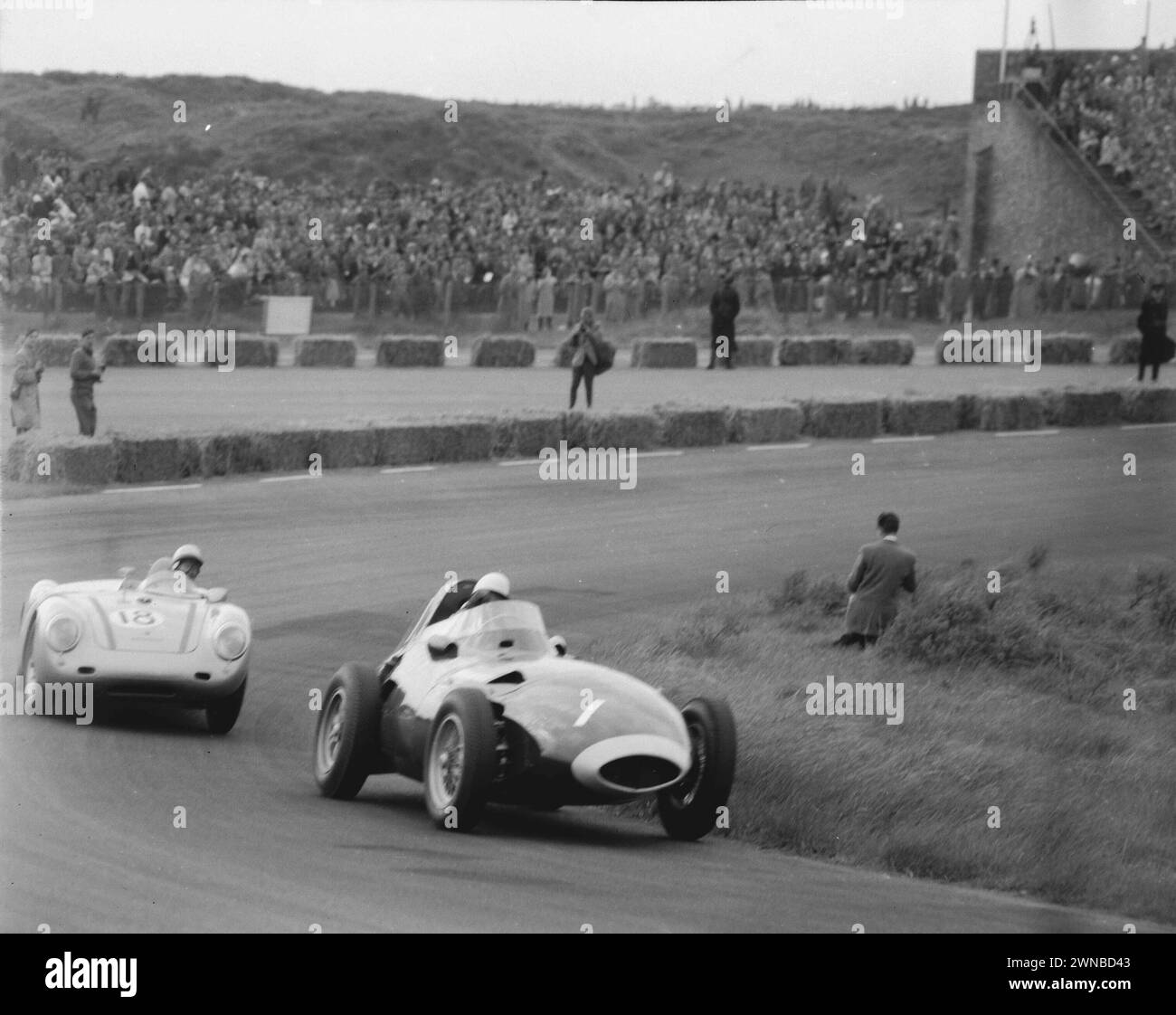 Zandvoort, Netherlands. May 26, 1958. Stirling Moss (1) has just lapped ...