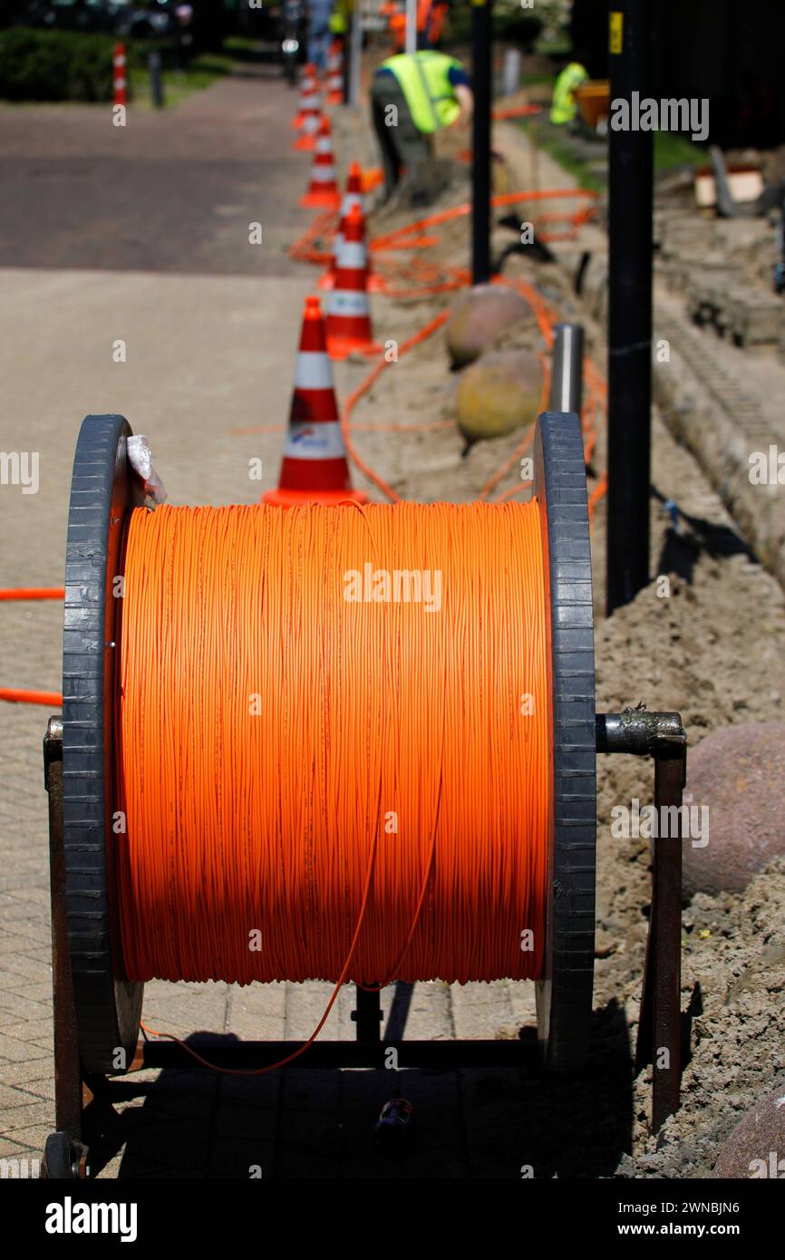 Installation and connecting fibre optic cables to neighbouring houses ...