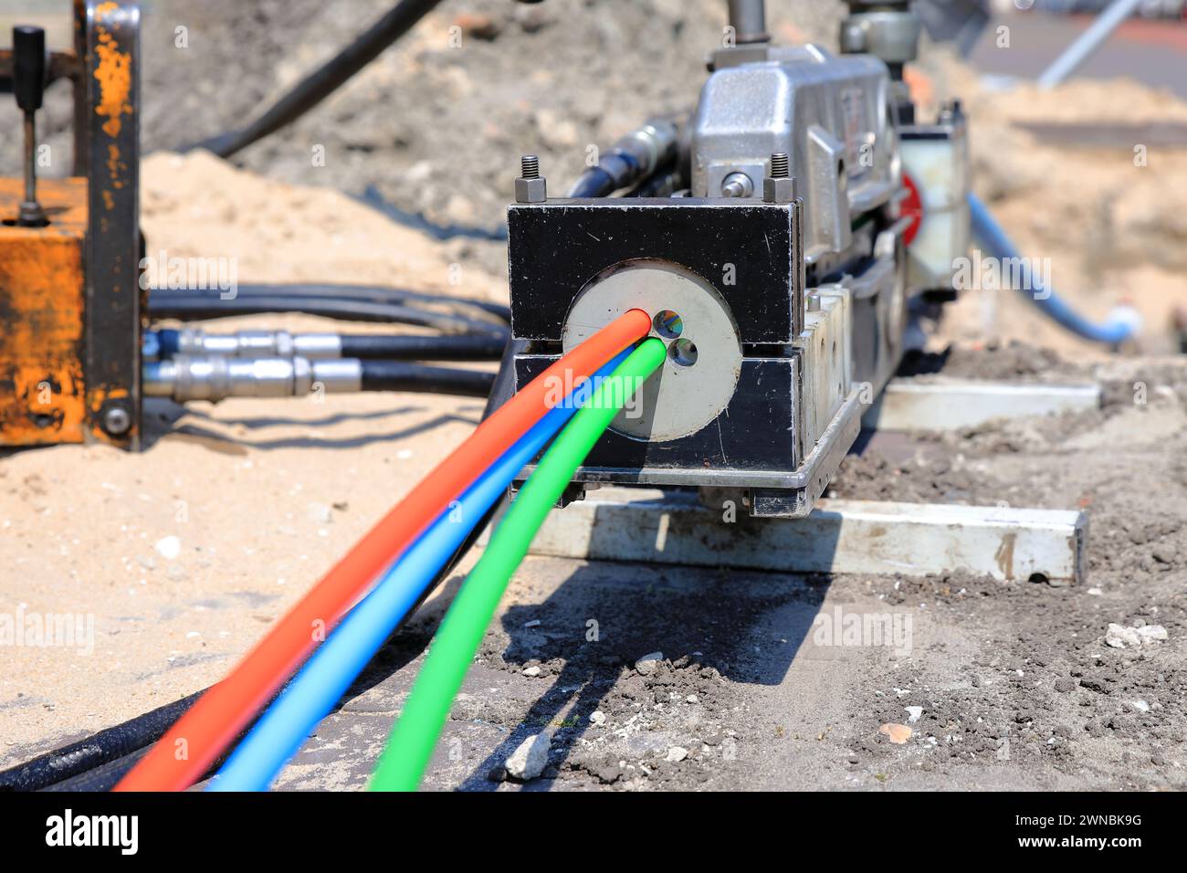 Installation and connecting fibre optic cables to neighbouring houses ...