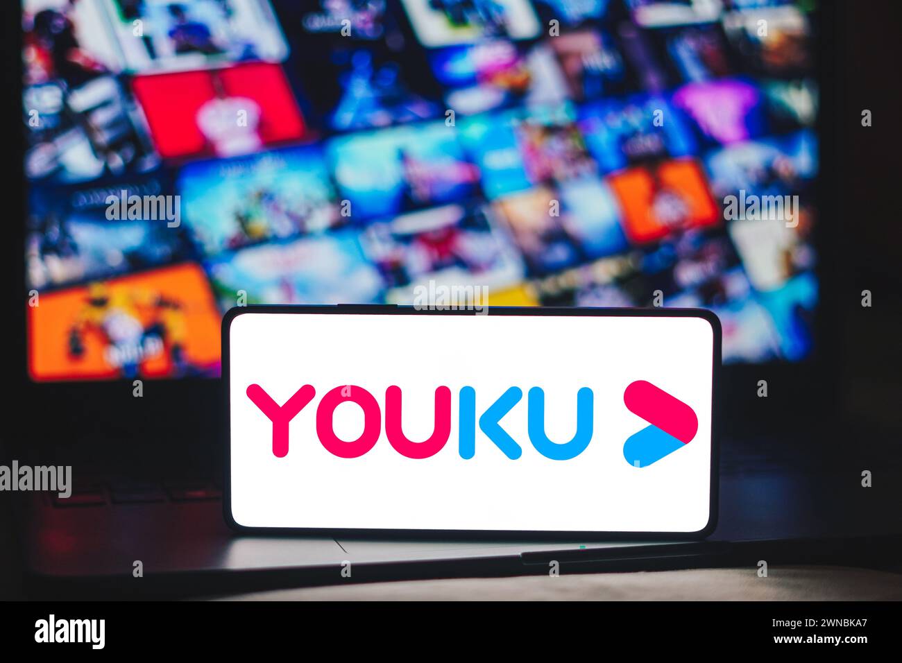 In this photo illustration, the Youku logo is displayed on a smartphone ...