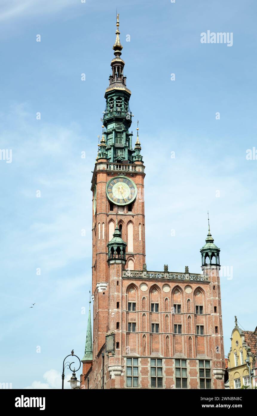The view of 15th century historic Gdansk Town Hall with a clock tower ...
