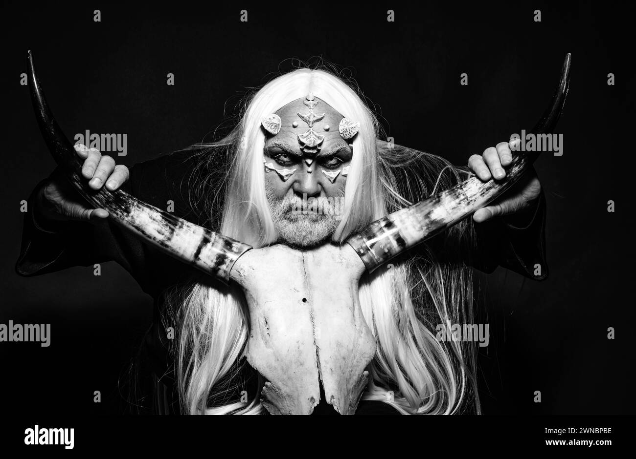 Man wizard with fantastic make up on demon face. Tree spirit and ...