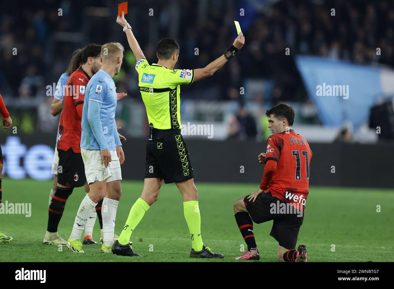Italian referee Marco Di Bello show red card for Lazio's French midfielder Matteo Guendouzi and ...
