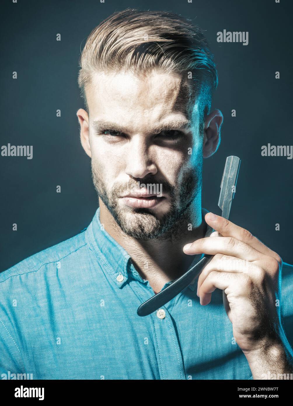 Stylish brutal bearded man with straight razor. Vintage barbershop ... Stylish brutal bearded man with straight razor. Vintage barbershop ...