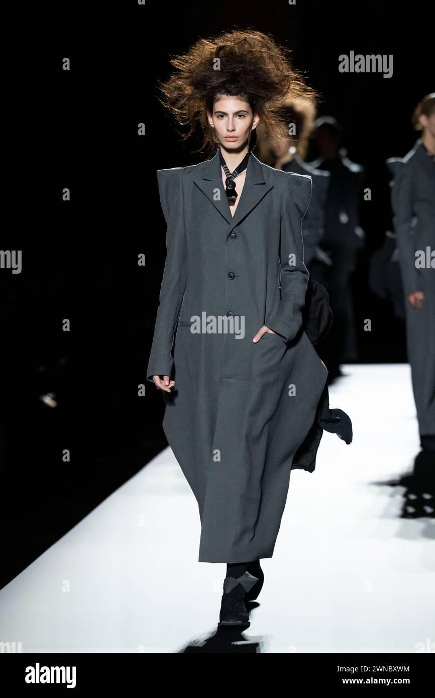A model wears a creation as part of the Yohji Yamamoto Fall/Winter 2024 ...