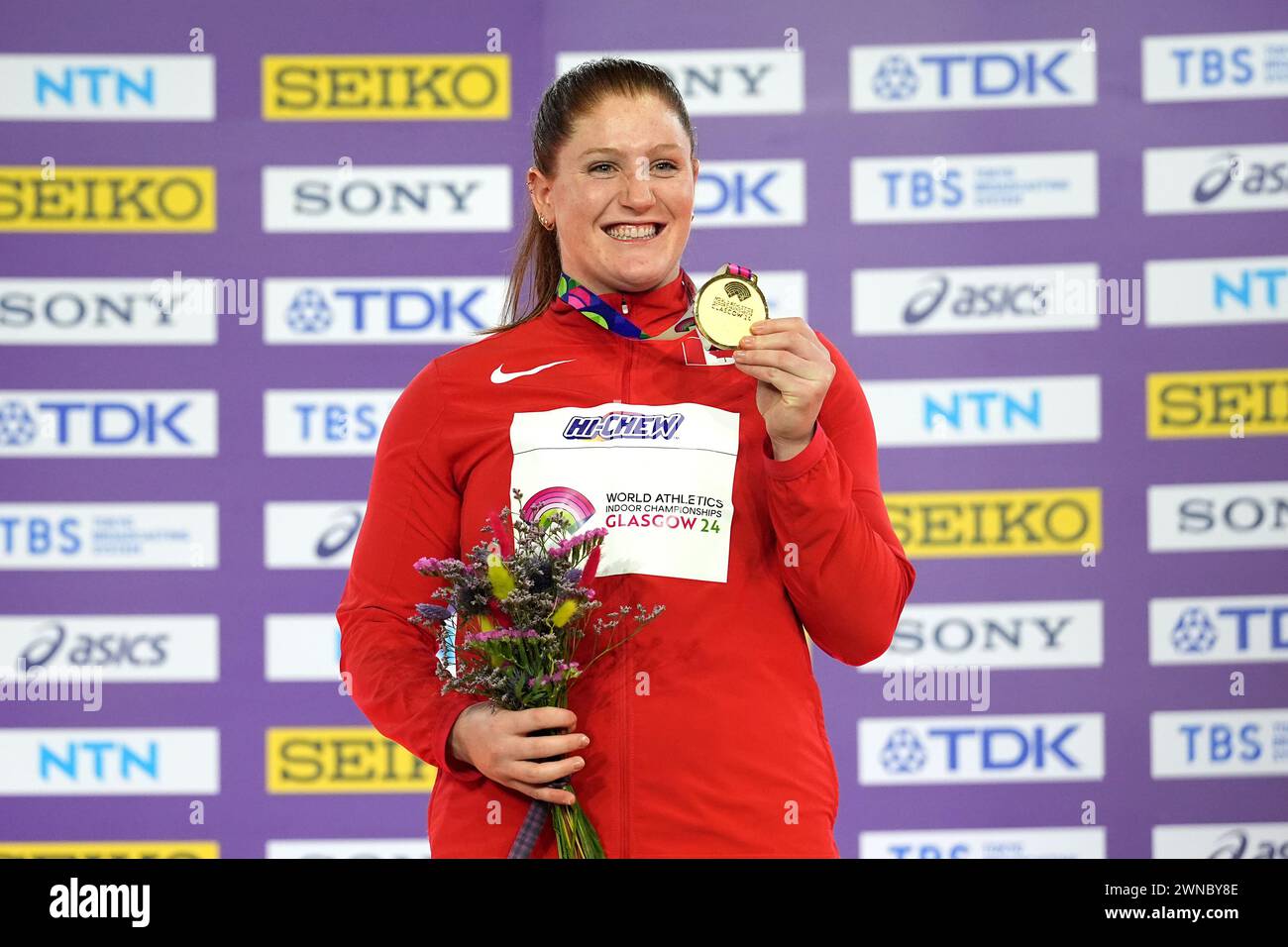 Canada's Sarah Mitton celebrates with the gold medal after winning the ...