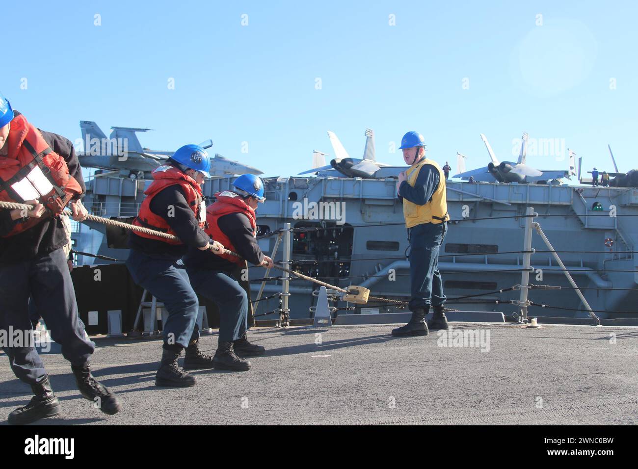 Sailors aboard the Arleigh Burke-class guided missle destroyer USS ...