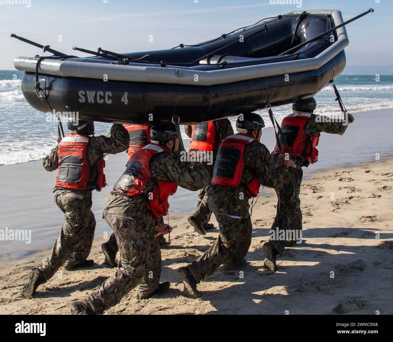 240116-N-DV011-1266 CORONADO, Calif. (Jan. 16, 2024) A U.S. Navy Special Warfare Combat Crewman ...