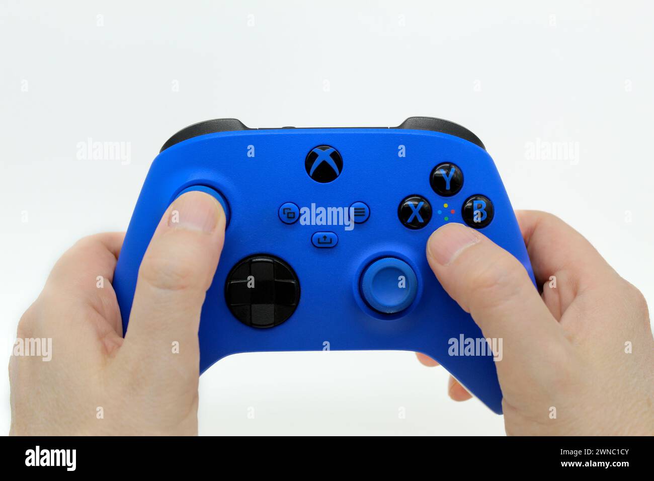 An Xbox controller being held on a white background Stock Photo - Alamy