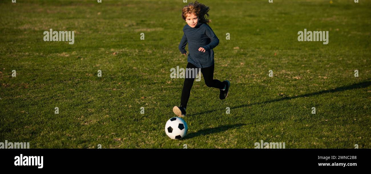 Soccer kid boy playing football. Child boy play football on outdoor ...