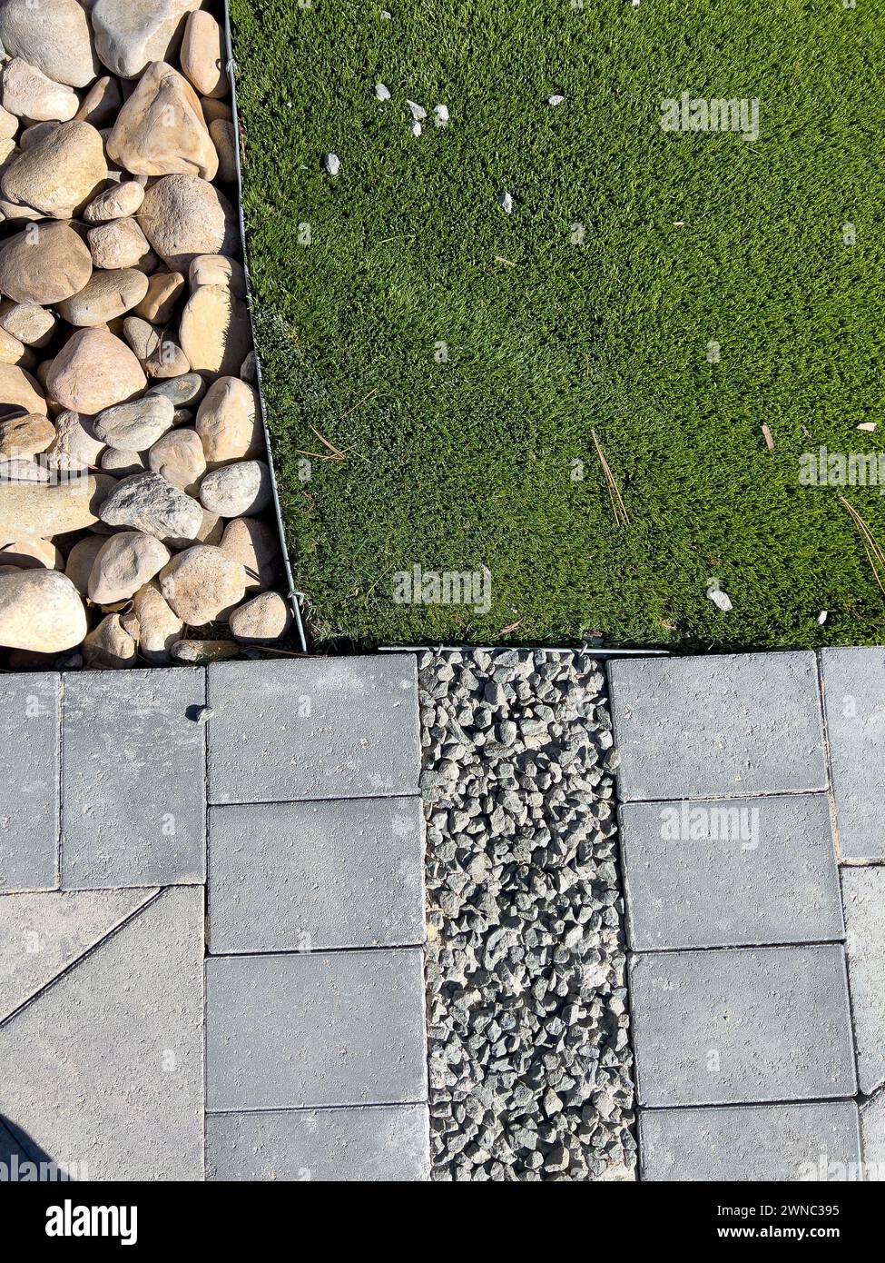 Modern Landscaping with Artificial Turf, Pebble Path, and Pavers Stock ...