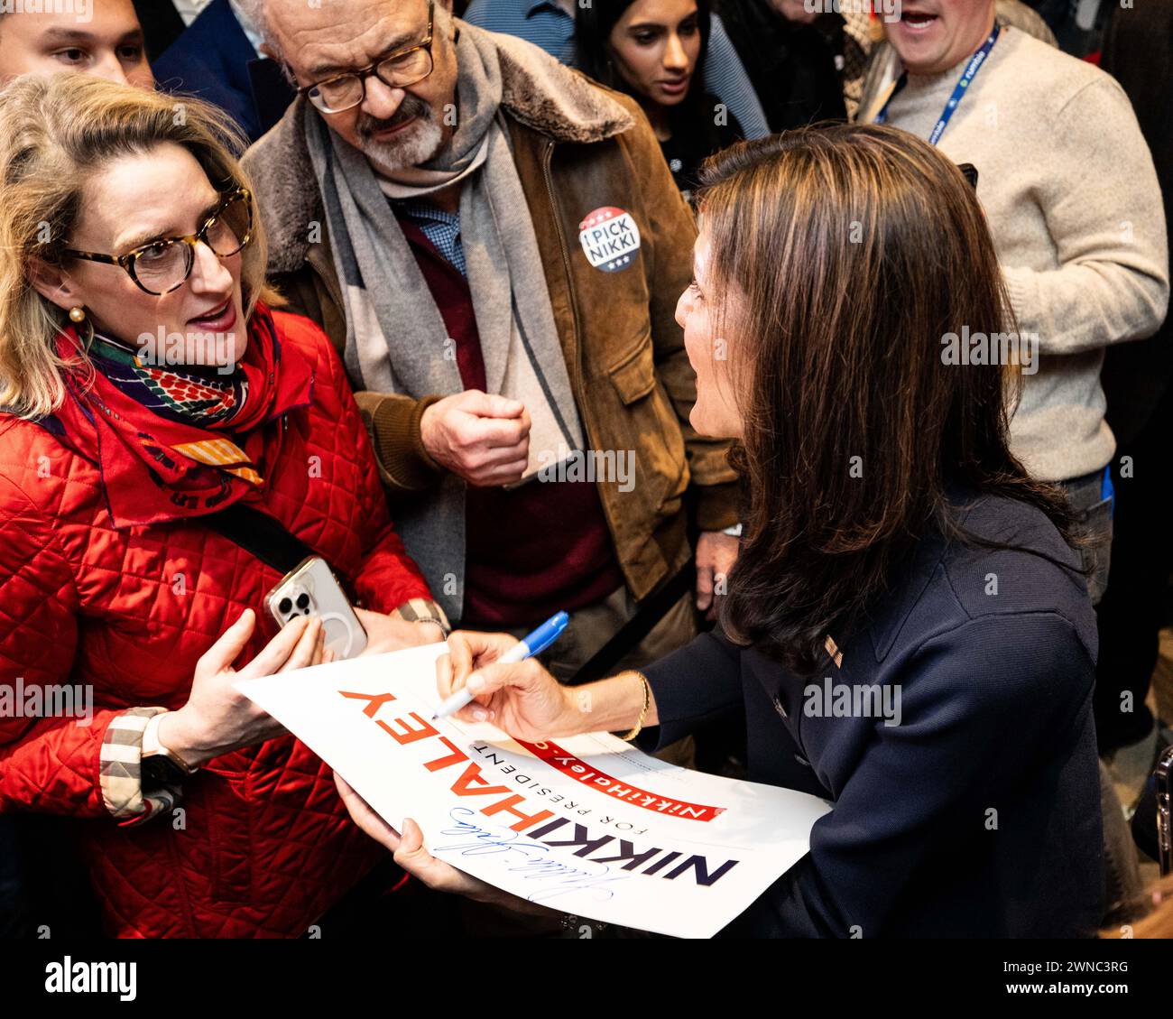 Washington, United States. 01st Mar, 2024. Nikki Haley signs a campaign ...