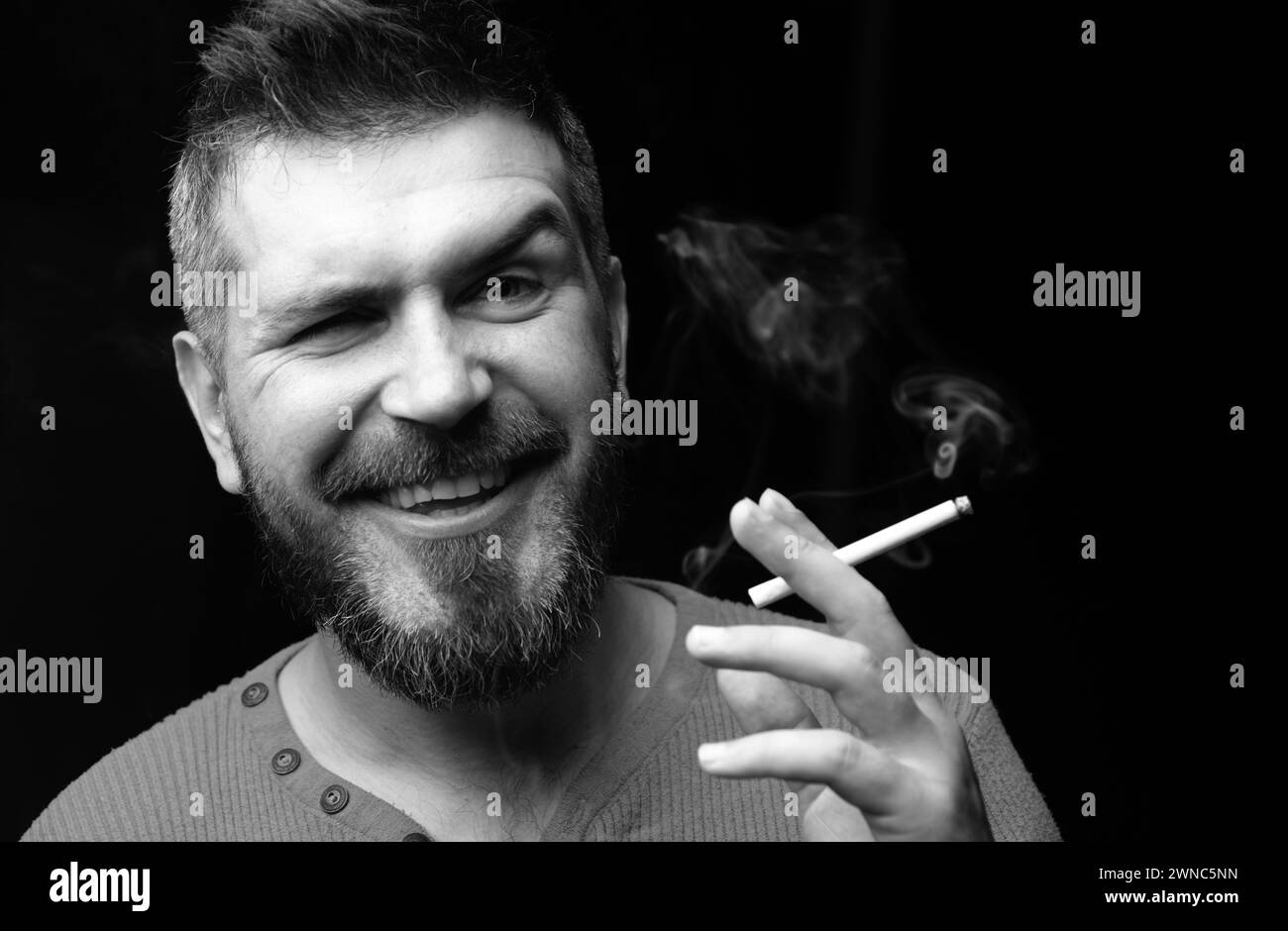 Stop smoking addiction. Bad guy addict with a syringe using drugs ...