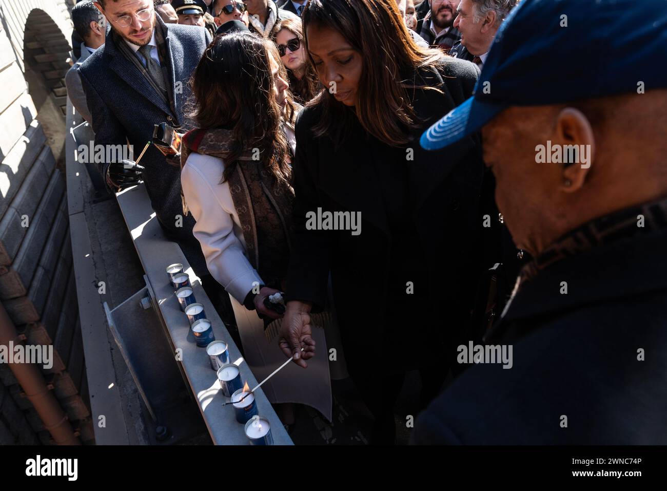 State Attorney General Letitia James lits candles on Ari Halberstam ...