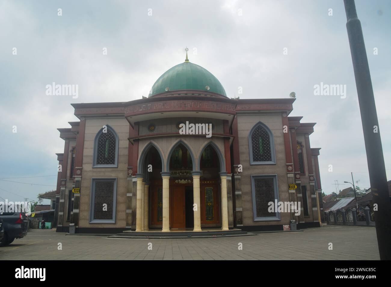 The exterior of a mosque in Wonosobo, Indonesia. mas is a place of ...