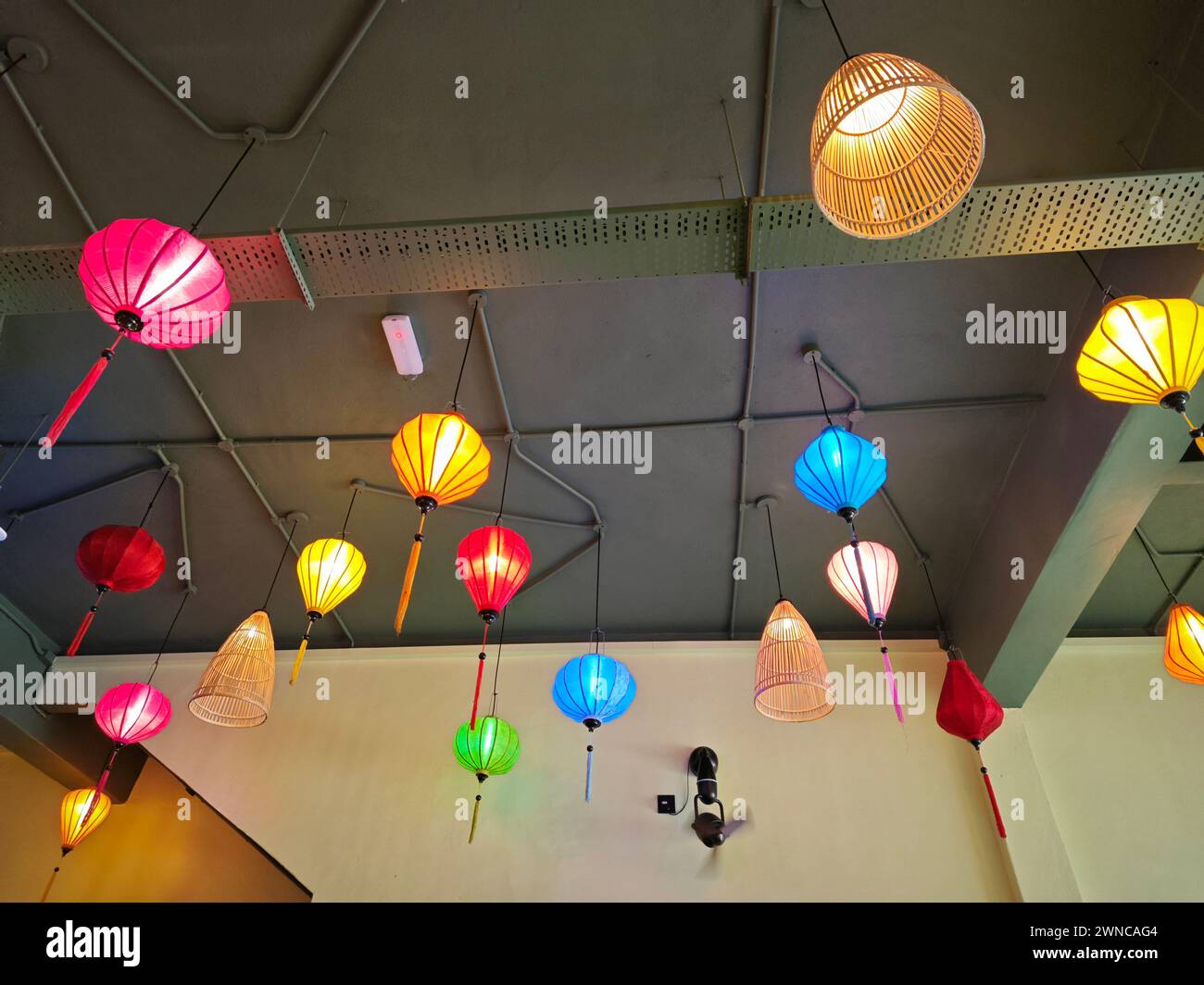 colorful designed electric ceiling light bulb Stock Photo - Alamy