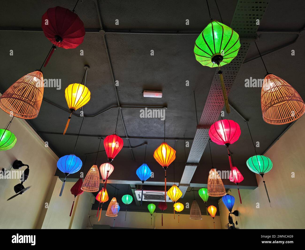 colorful designed electric ceiling light bulb Stock Photo - Alamy