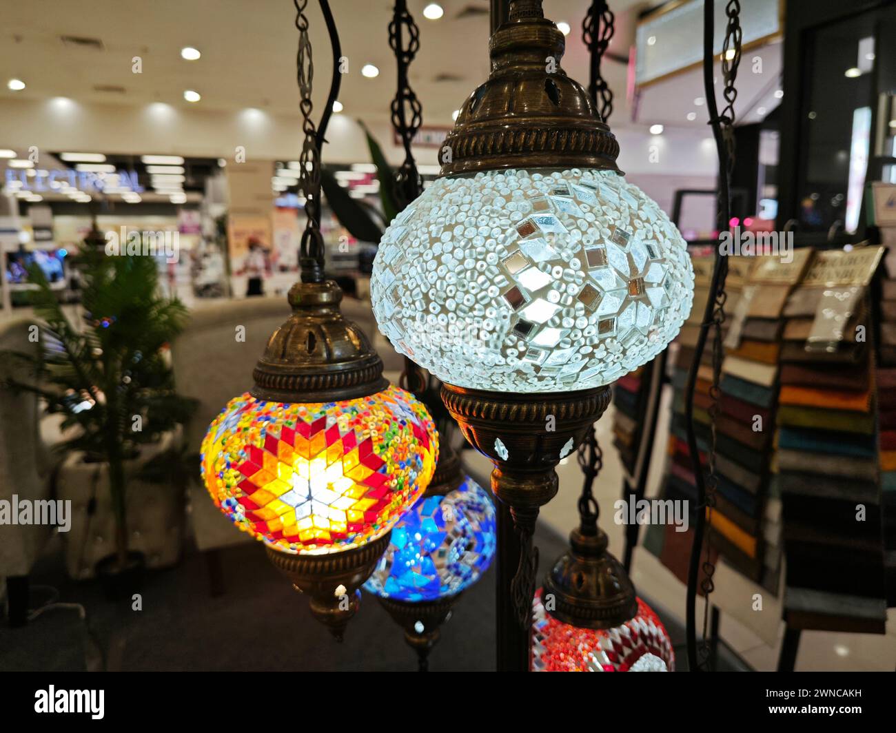 colorful designed electric light bulb stand Stock Photo - Alamy