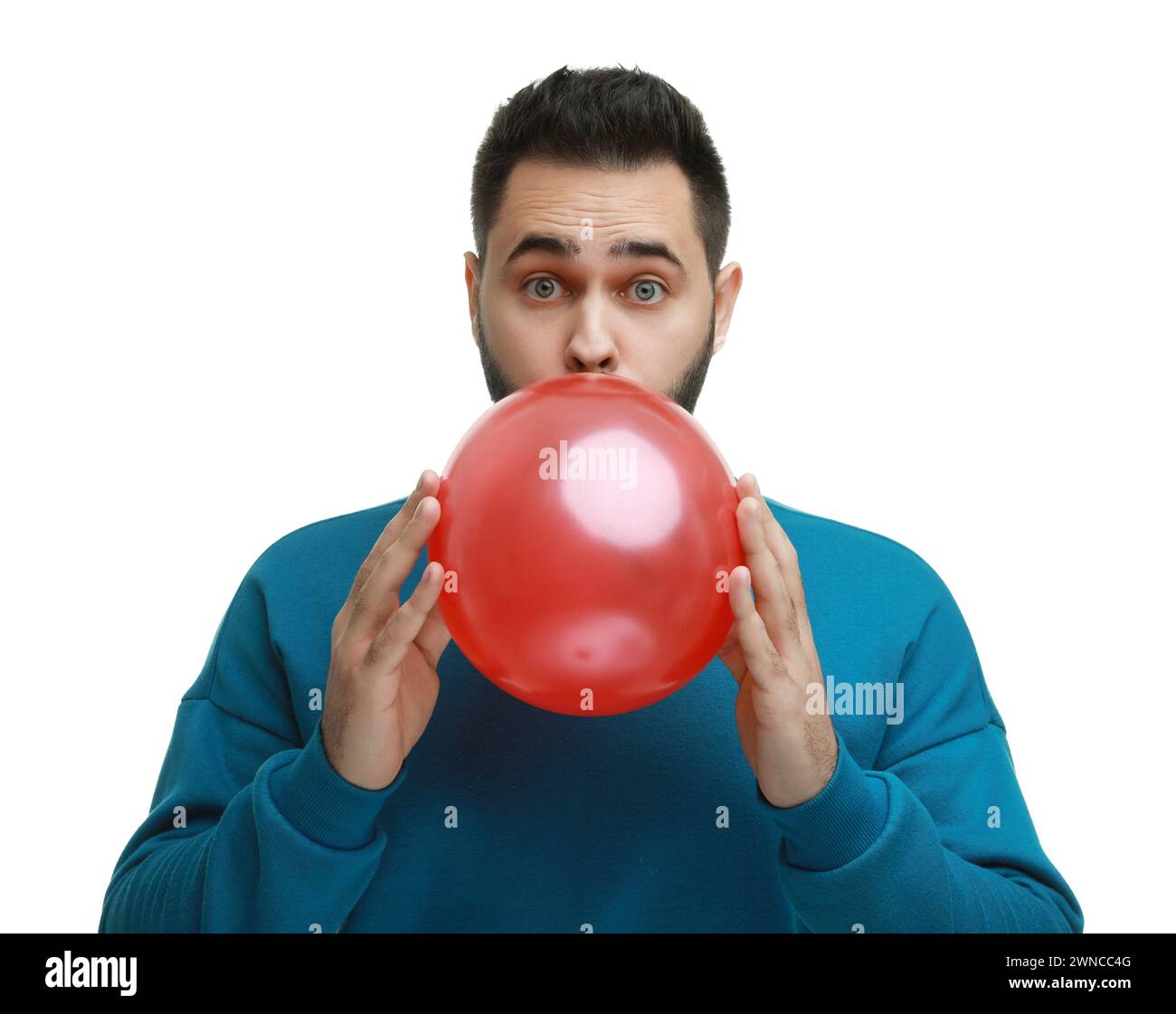 Man inflating bright balloon on white background Stock Photo - Alamy