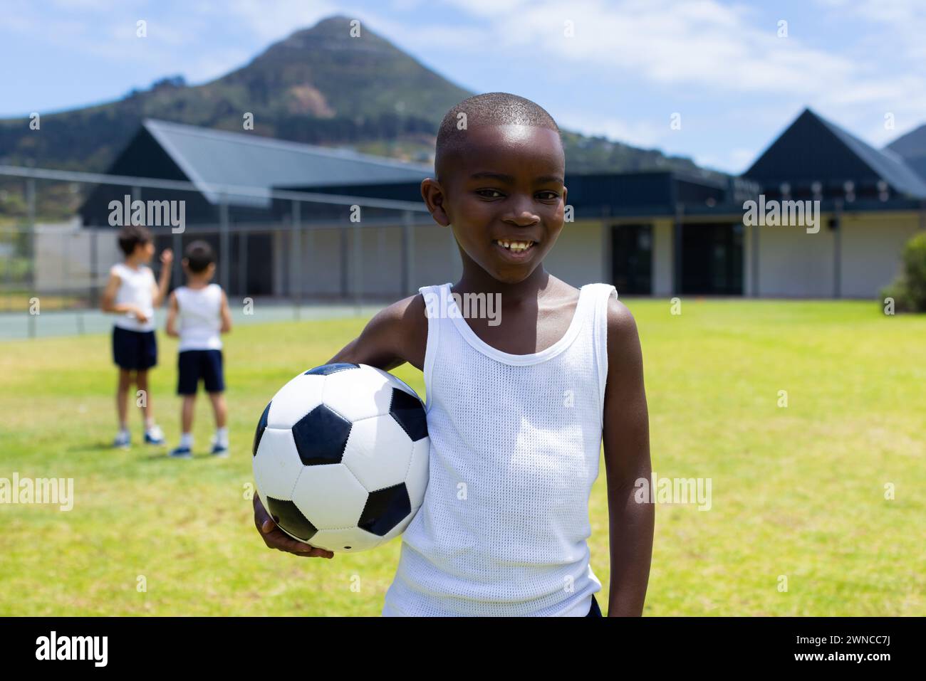 Black african boy playing soccer hi-res stock photography and images ...