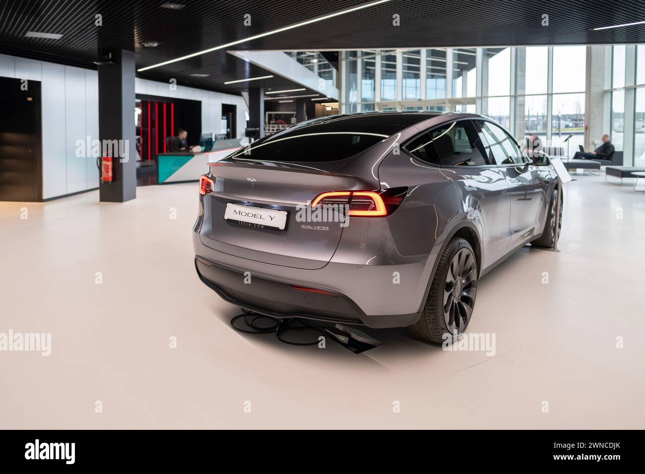 new grey electric tesla model y performance quicksilver rear view ...