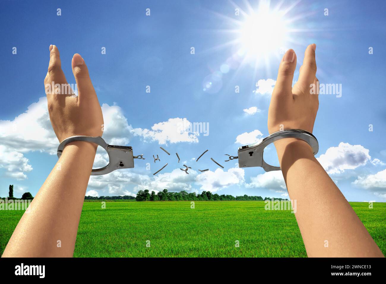 Woman hands and handcuffs hi-res stock photography and images - Alamy