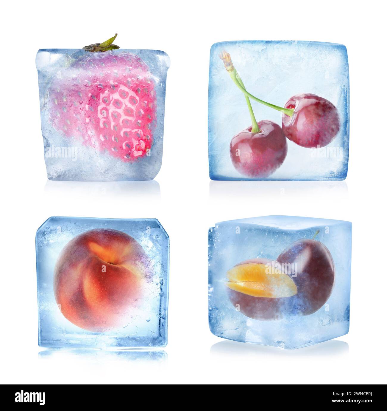 Frozen food. Different fruits in ice cubes isolated on white, set Stock ...