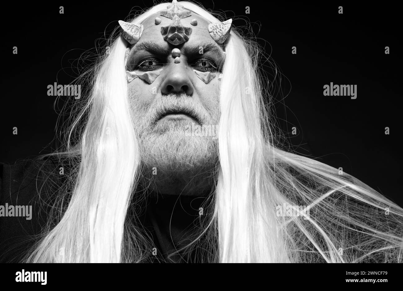 Horror with scary Halloween man. Viking with a horned head. Satan on ...