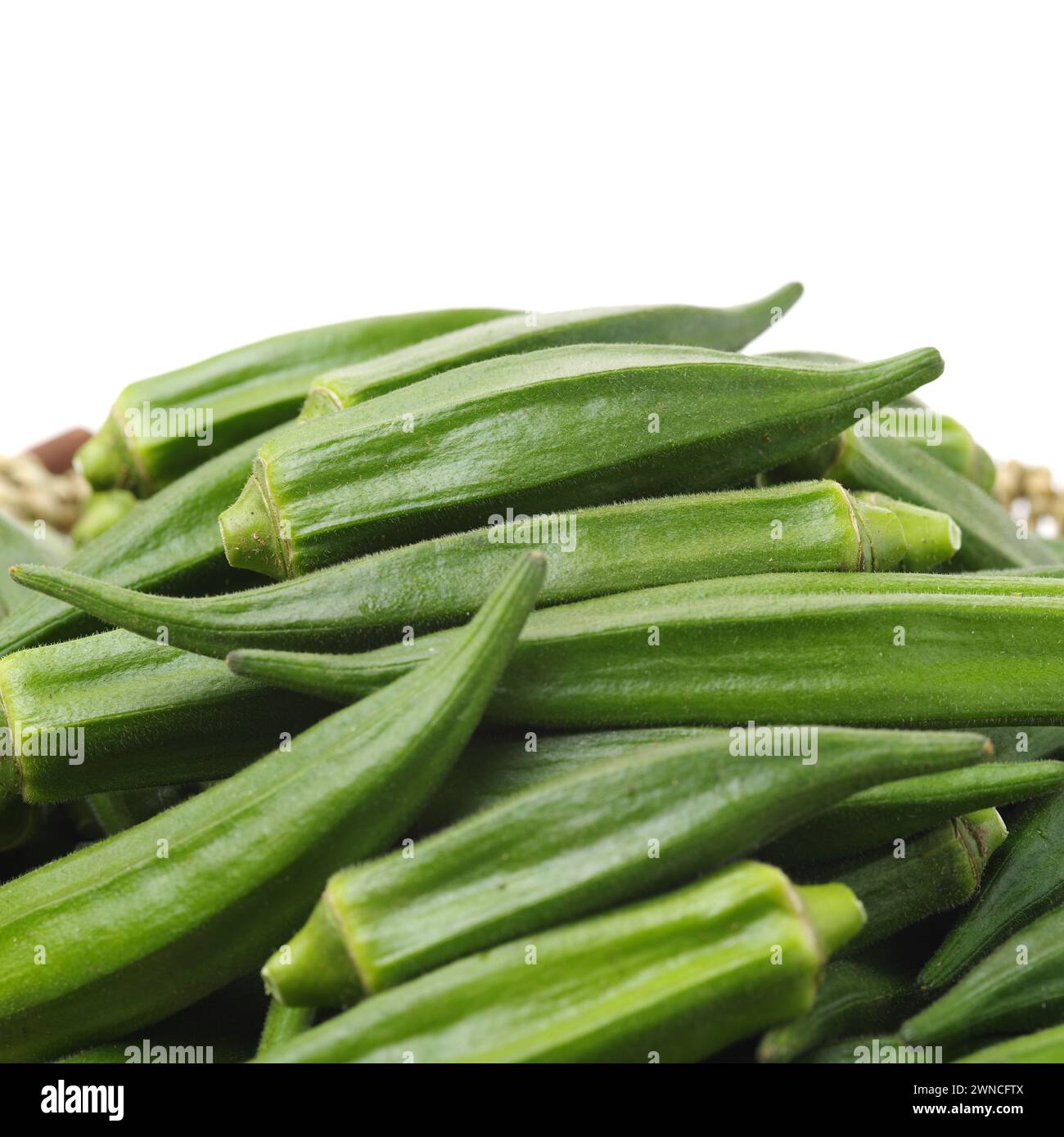 Fresh young okra isolated on white background Stock Photo - Alamy