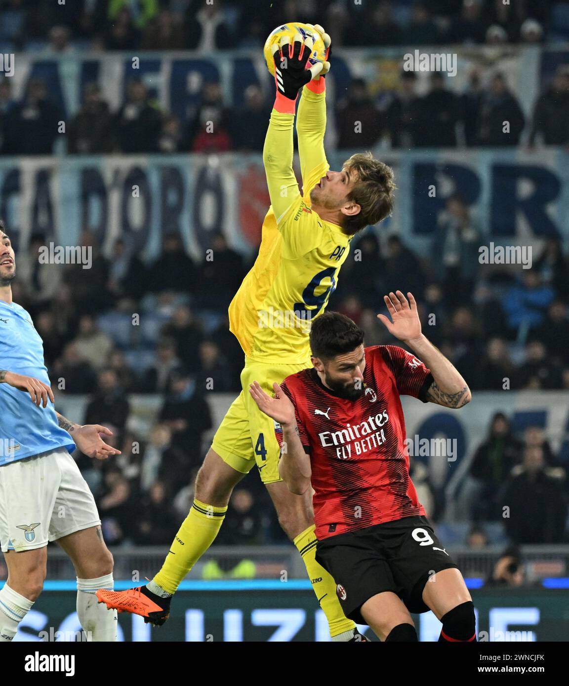 Rome, Italy. 1st Mar, 2024. AC Milan's Olivier Giroud (R) vies with ...