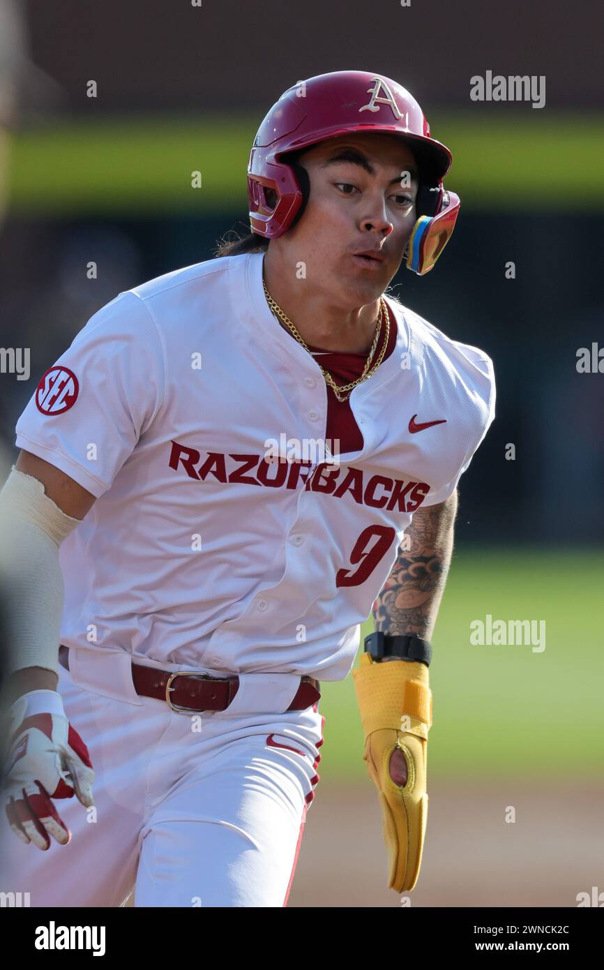 March 1, 2024: Razorback base runner Wehiwa Aloy #9 moves between ...