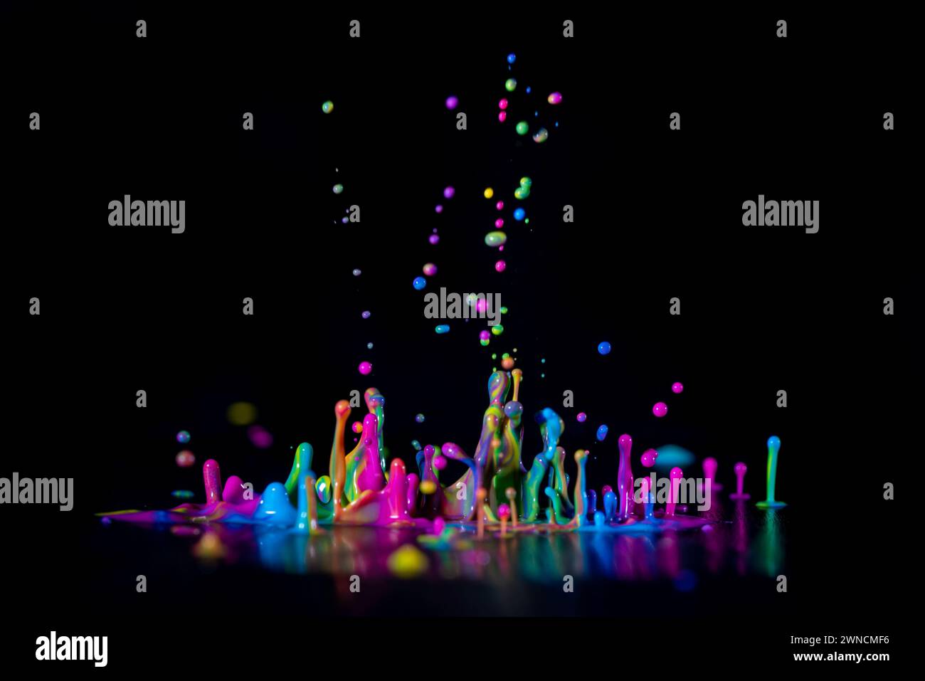 Splash of multi-coloured paint Stock Photo - Alamy