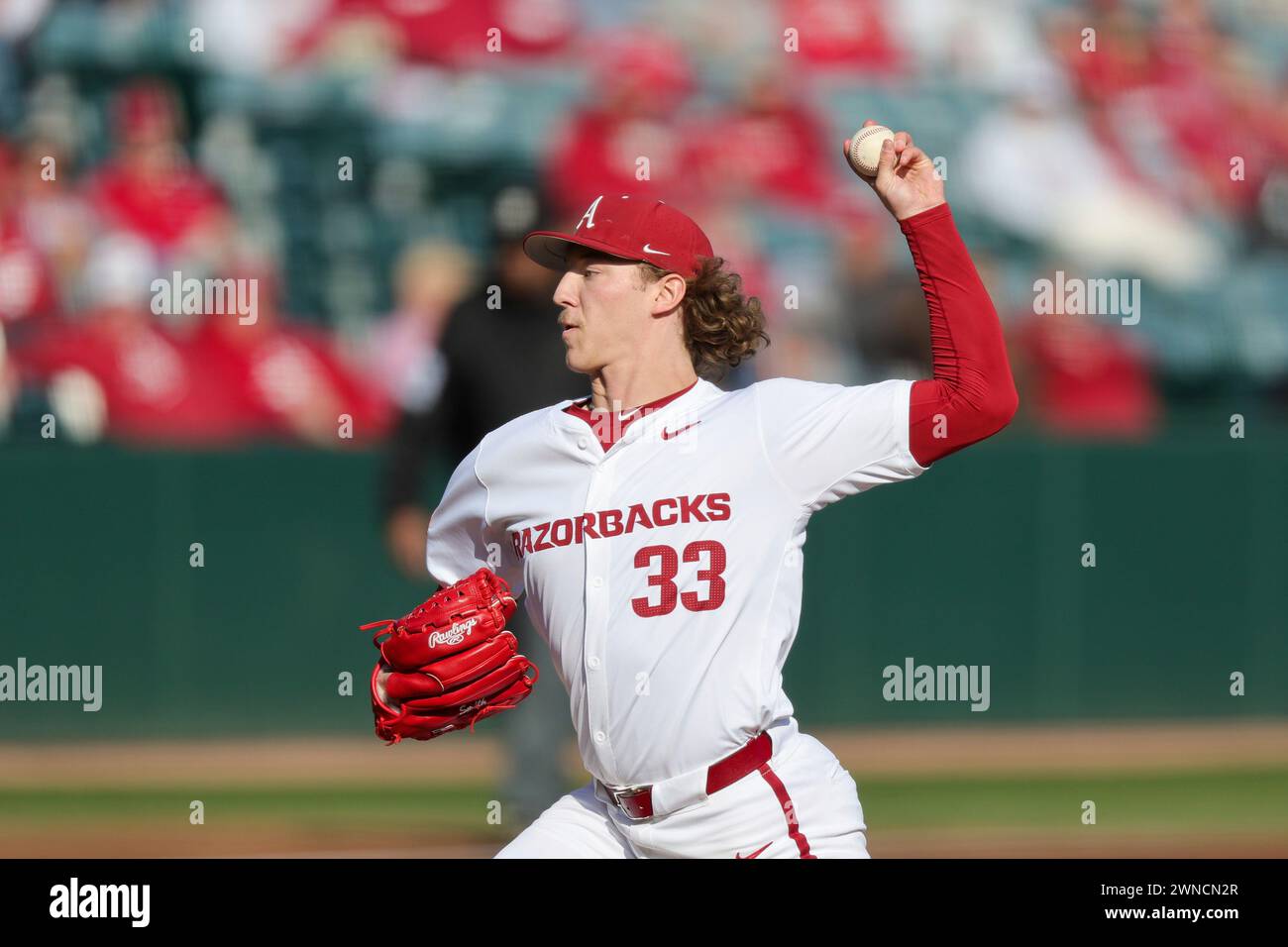 March 1, 2024: Hagen Smith #33 of Arkansas prepares to release the ball ...