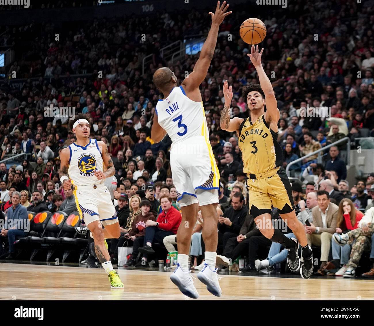 Toronto Raptors guard D.J. Carton, right, shoots while Golden State ...