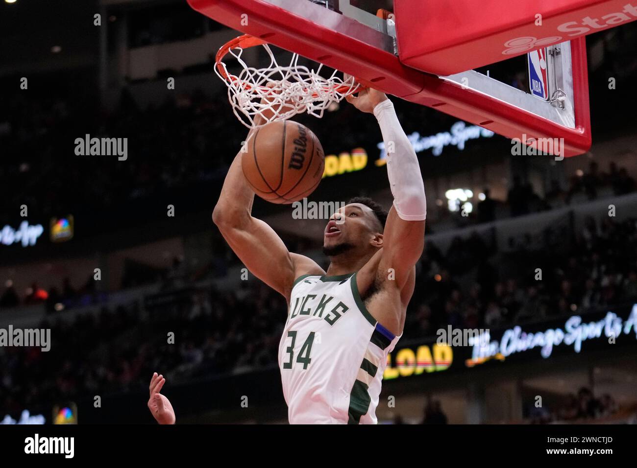 Milwaukee Bucks' Giannis Antetokounmpo dunks against the Chicago Bulls ...