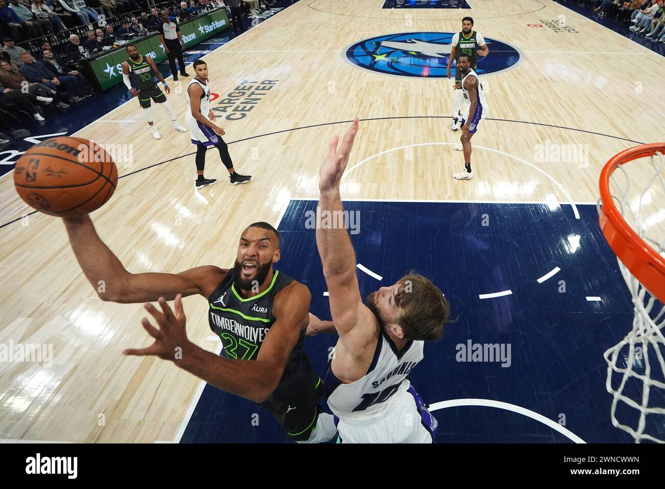 Minnesota Timberwolves center Rudy Gobert (27) shoots over Sacramento Kings forward Domantas ...