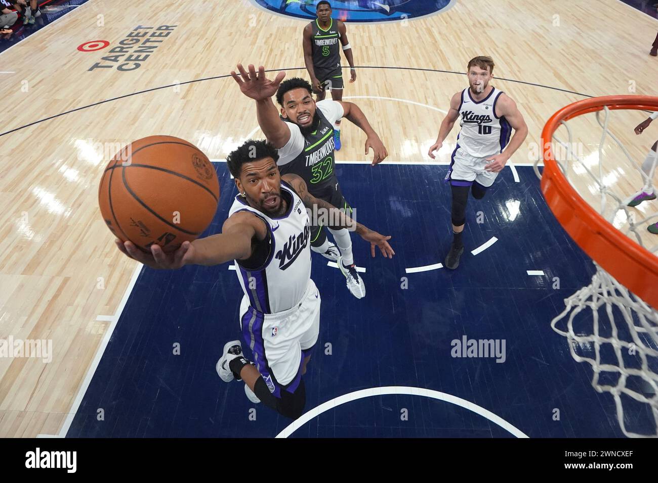 Sacramento Kings guard Malik Monk, front, shoots as Minnesota ...