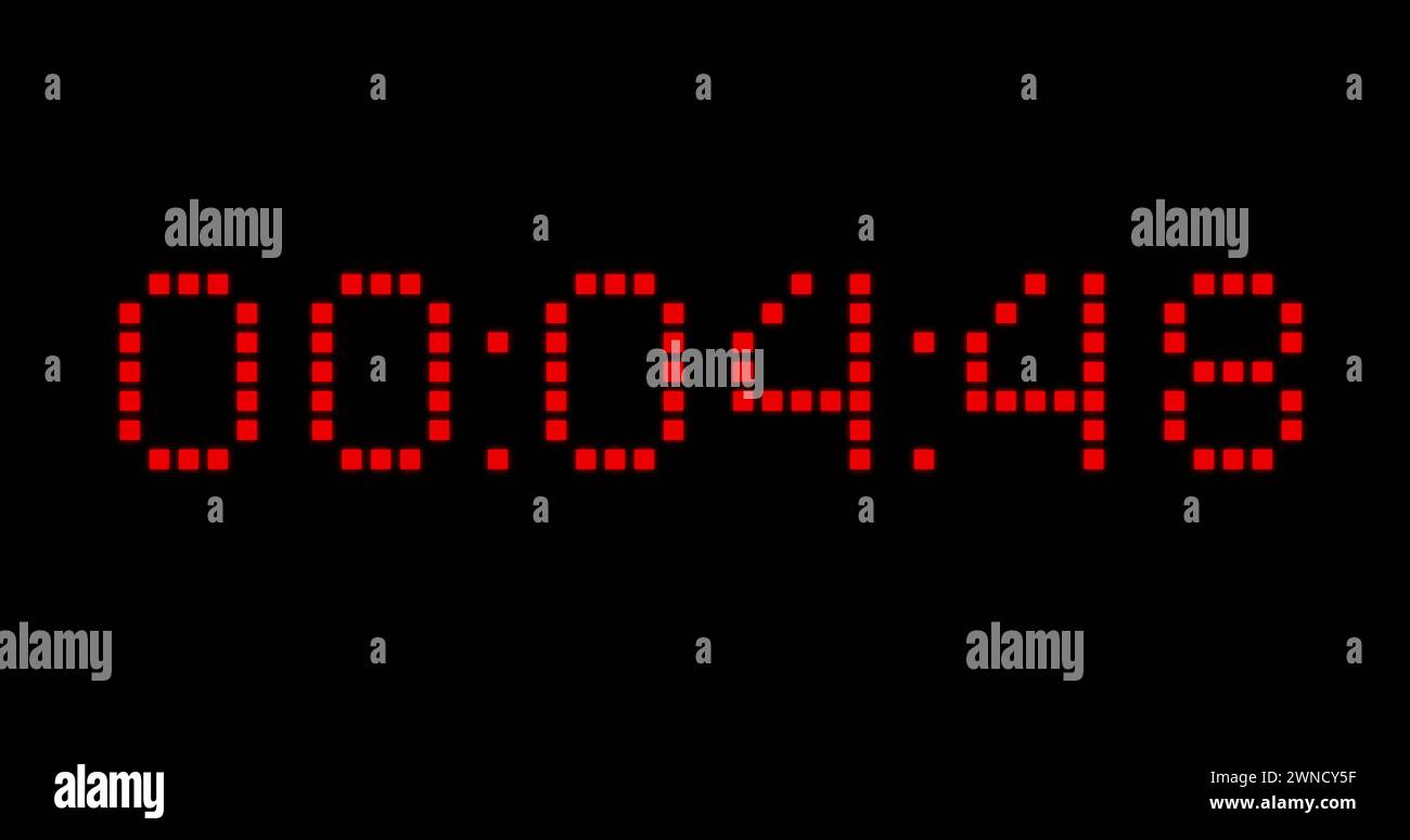 Image of red digital timer changing on black background Stock Photo - Alamy