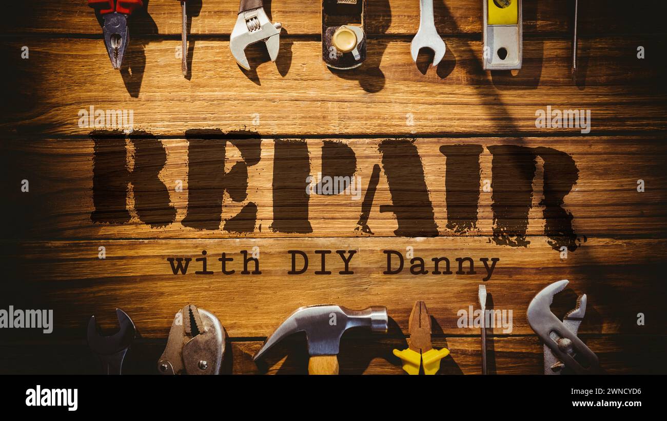 Repair with diy danny text with two rows of tools on wooden floorboards ...