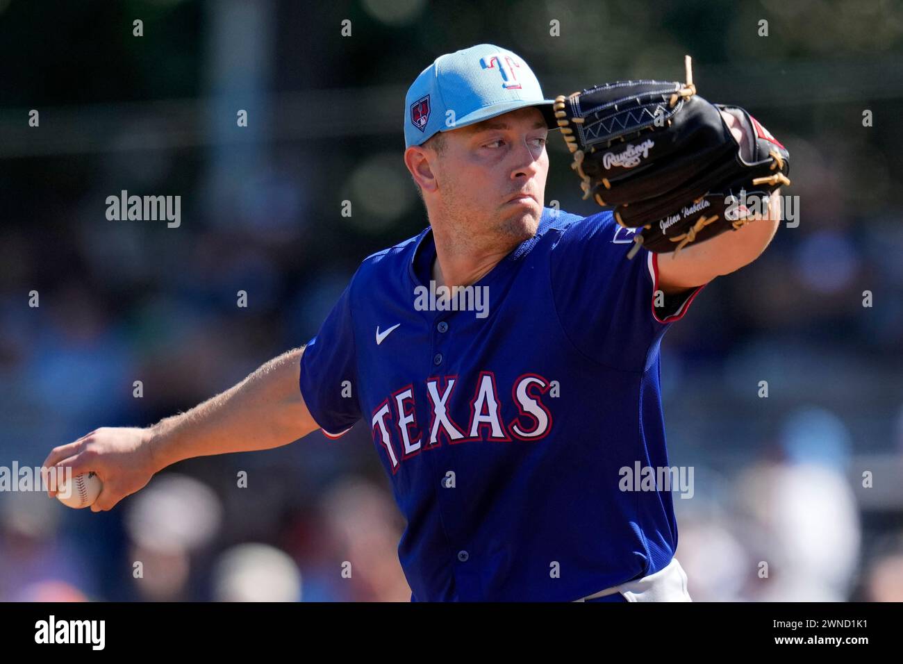 Texas Rangers starting pitcher Adrian Sampson throws against the San ...